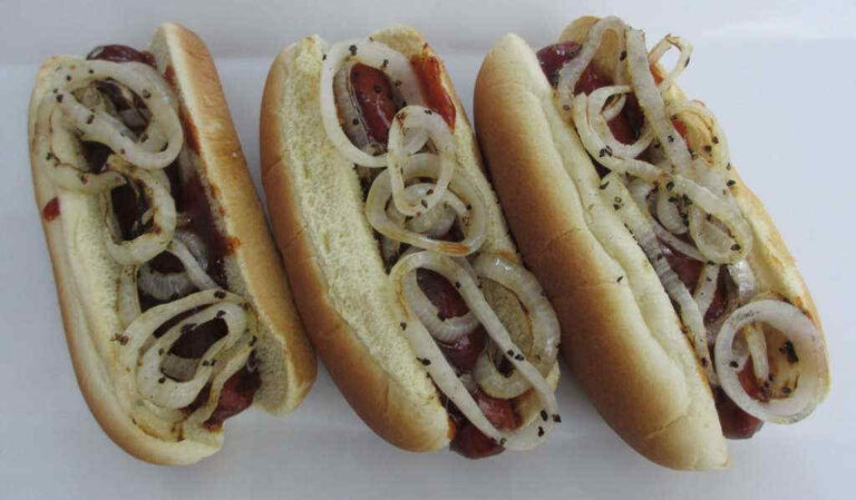 Hot Dogs with Spicy Sauce and Grilled Onions - Life's A Tomato